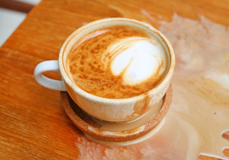 Coffee Spilled on the Wood Table Stock Image - Image of beverage, cream ...