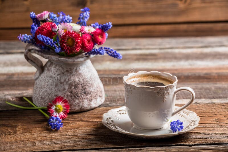 Coffee and spring flowers stock image. Image of flower - 49882993