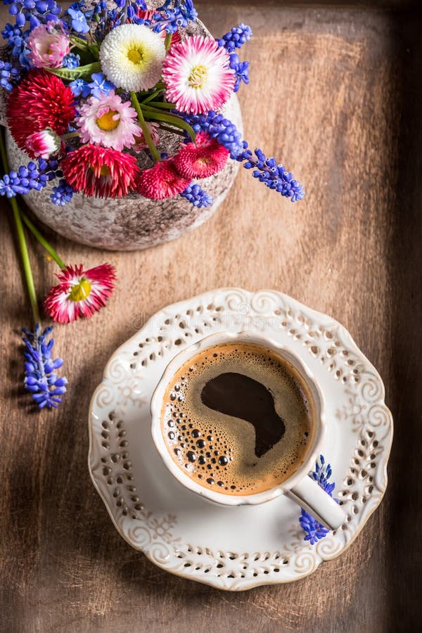 Coffee and spring flowers stock photo. Image of porcelain - 49883730