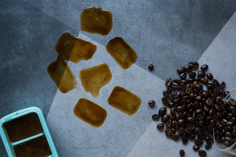 Coffee Stains on Ground from Ice Cubes and Coffee Beans Stock Image ...