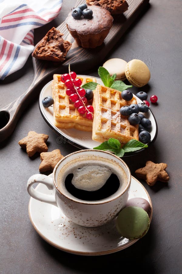 Coffee, sweets and waffles stock image. Image of crispy - 95452513