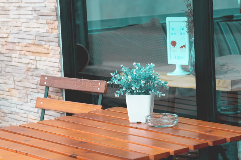 Coffee table and chairs stock image. Image of terrace - 103482377