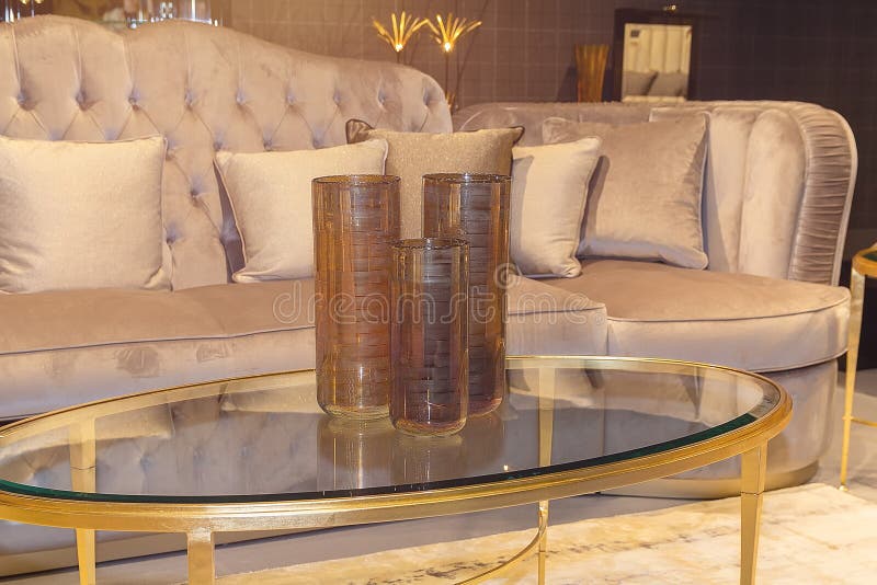 Coffee Table with a Clear Glass Top with Elegant Vases in a Bright Room ...