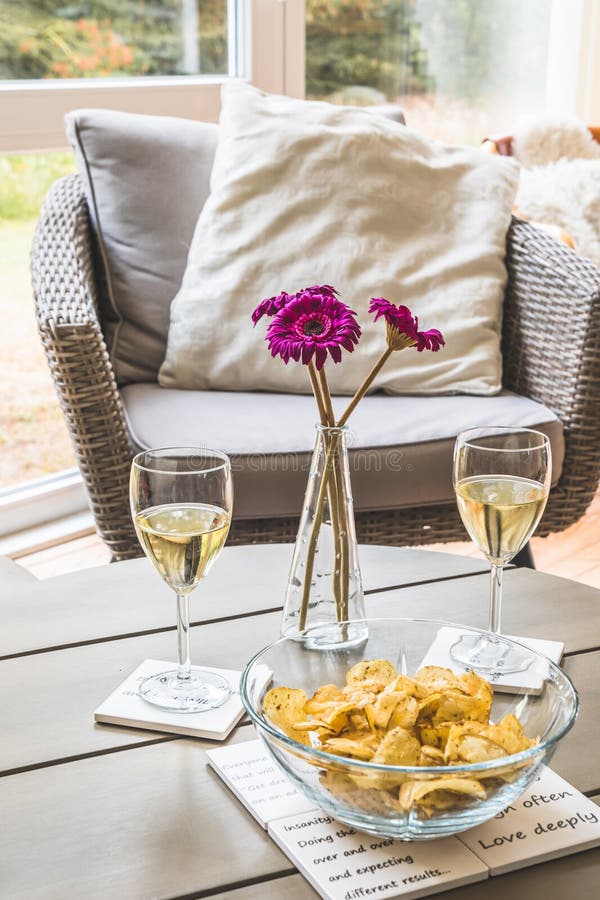 Coffee Table with Wine Glasses and a Snack in a Winter Garden Stock ...