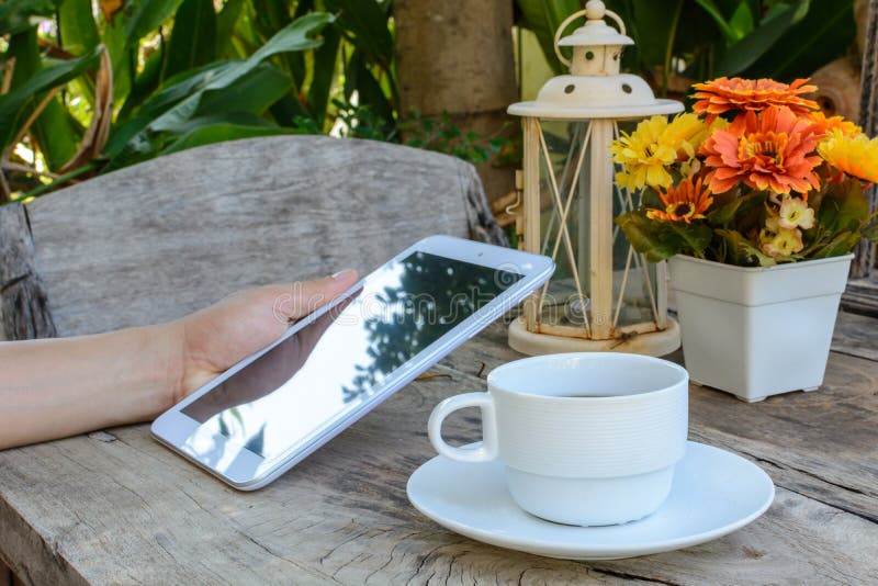 Coffee, Tablet on Wood Floor with Flower Stock Photo - Image of monitor ...