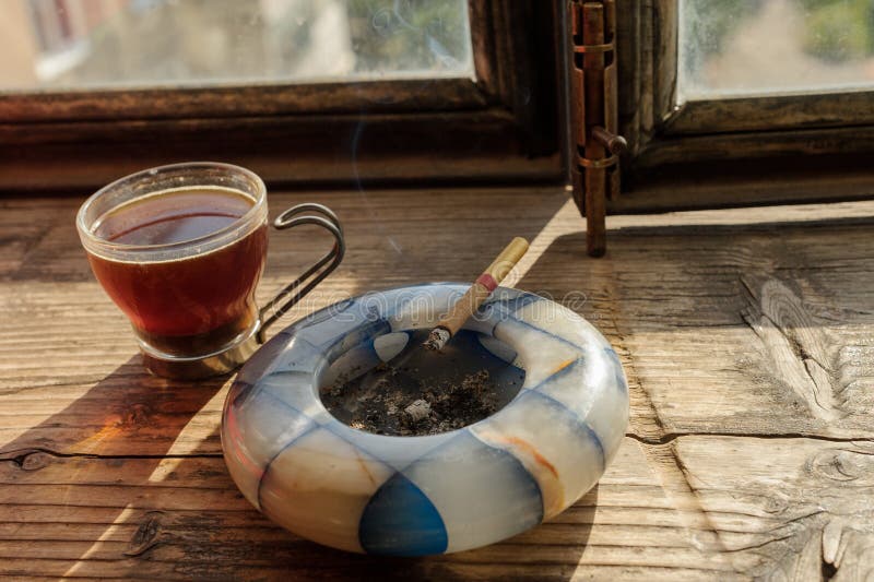 Coffee or Tea Cup and Ashtray for Cigarettes, Coffee Drinking Mug Stock ...