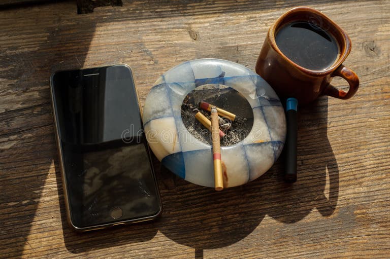 Coffee or Tea Cup and Ashtray for Cigarettes, Coffee Drinking Mug Stock ...