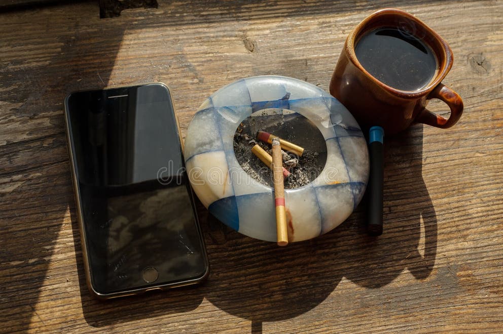 Coffee or Tea Cup and Ashtray for Cigarettes, Coffee Drinking Mug Stock ...