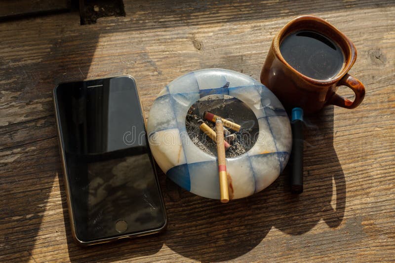 Coffee or Tea Cup and Ashtray for Cigarettes, Coffee Drinking Mug Stock ...