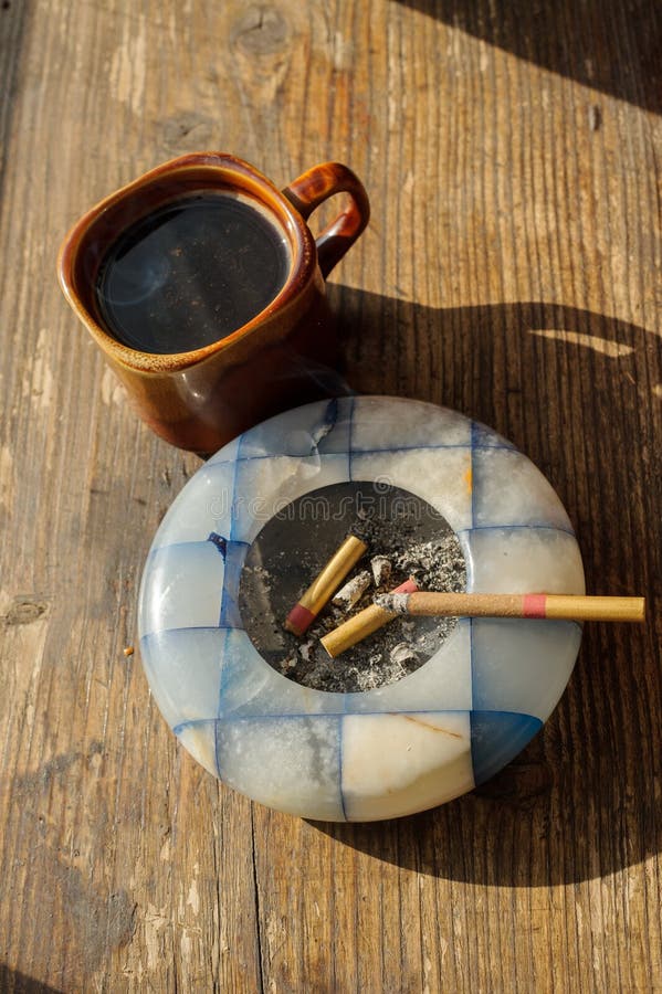 Coffee or Tea Cup and Ashtray for Cigarettes, Coffee Drinking Mug Stock ...