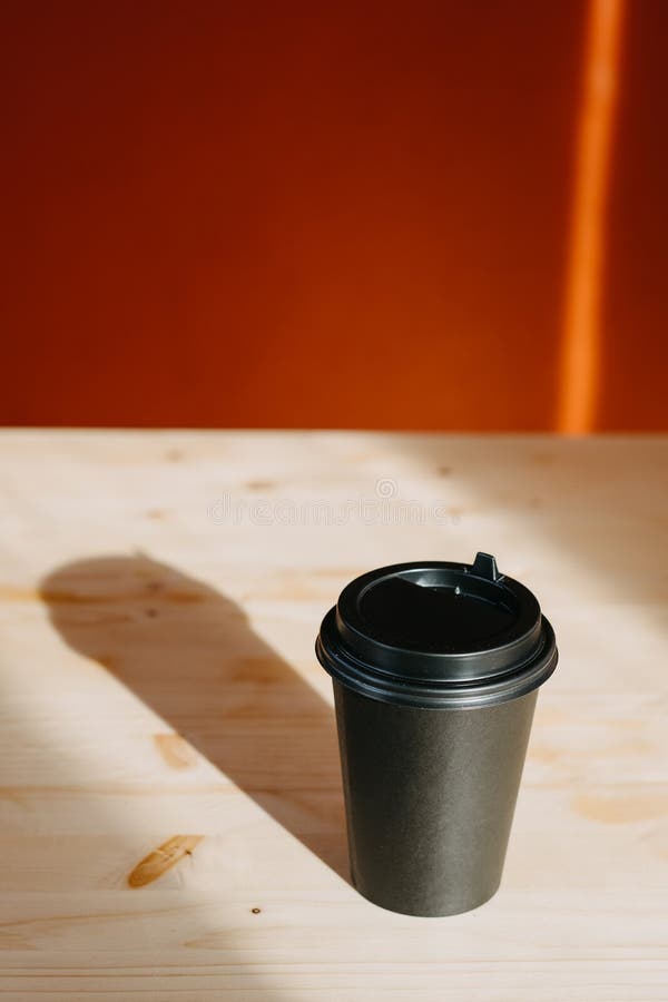 Coffee To Go. Black Glass for Coffee on a Table on a Red Background ...