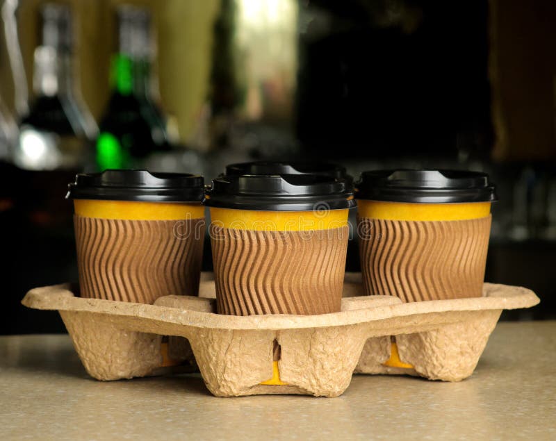 Coffee To Go. Coffee Paper Cups on a Stand in a Coffee Shop Stock Photo ...