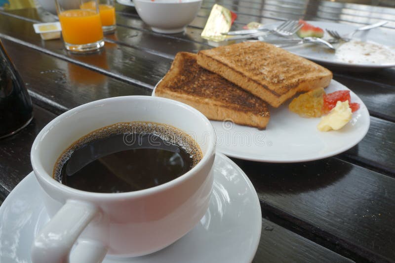 Coffee and Toast on the Table Stock Image - Image of cafe, butter: 68448469
