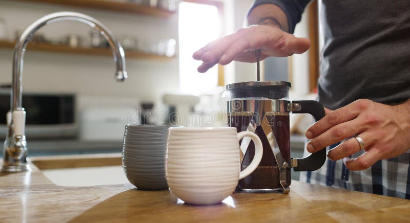 Coffee for Two. an Unrecognizable Man Making Two Cups of Coffee. Stock ...