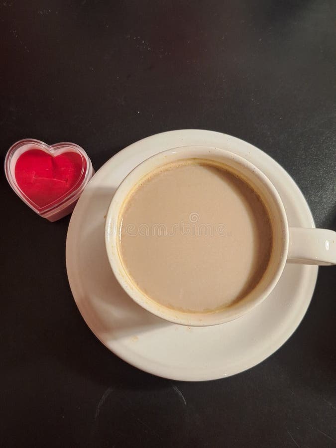 Coffee and Wedding Rings on the Black Table Stock Image - Image of dark ...