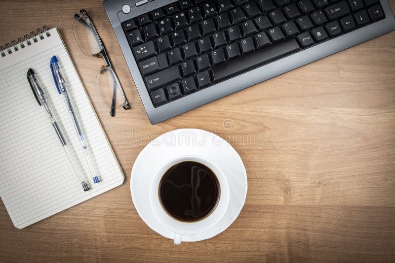 Coffee at Work, Office Desk with Computer Keyboard and Office Supplies ...