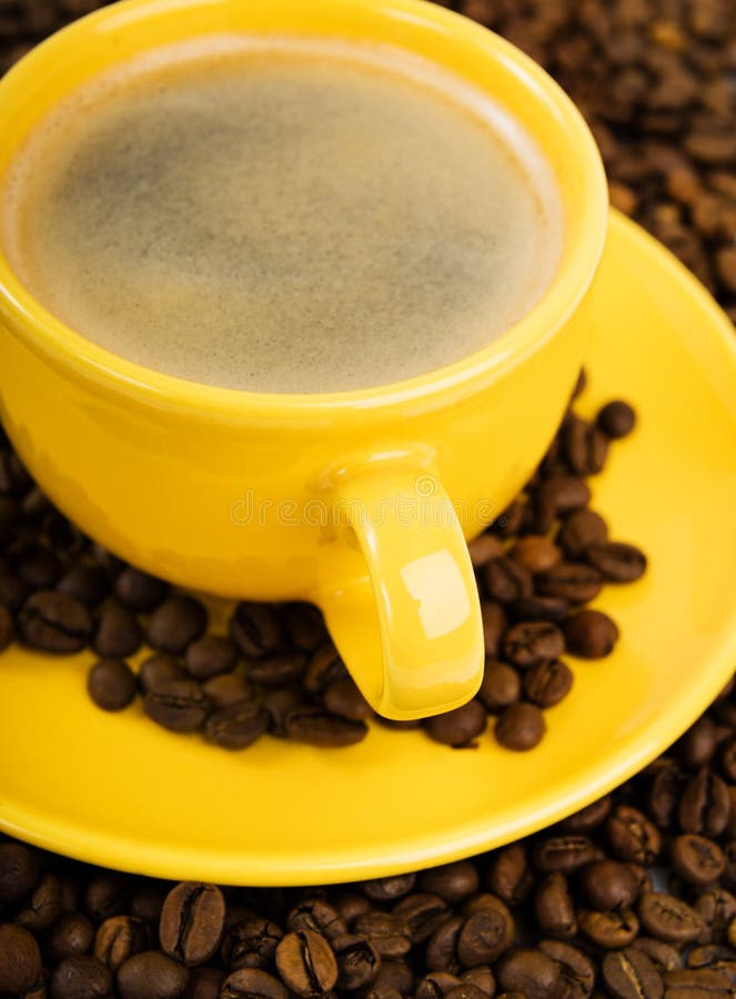 Coffee in yellow cup stock photo. Image of java, grain - 29022072