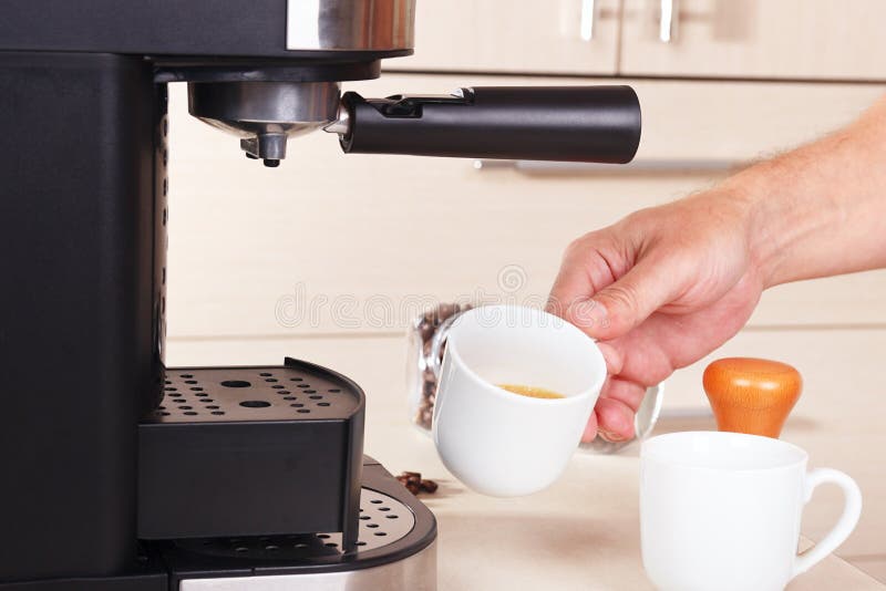 Coffeemaker Hands with Two Cups of Espresso Makes in Coffee Machine ...