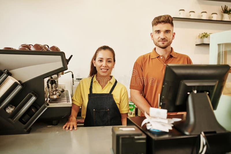 Coffeeshop Workers Standing at Counter Stock Photo - Image of cheerful ...