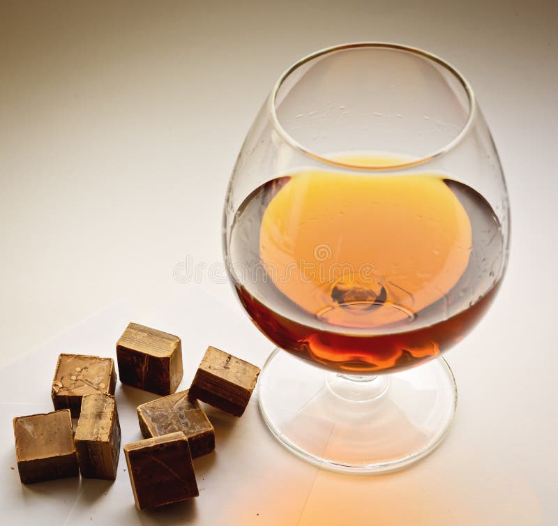 Cognac with Dark Chocolate on White Background Stock Photo - Image of ...