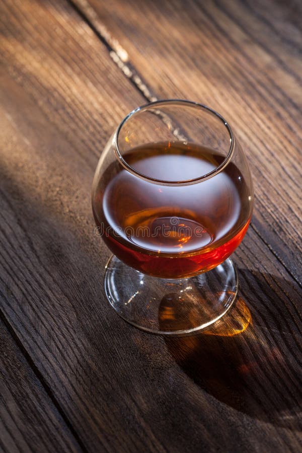 Cognac in Glass on the Wood Stock Image - Image of frozen, elegant ...
