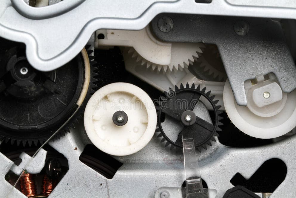 Cogs and Drive in Electronic Equipment. Stock Image - Image of laser ...