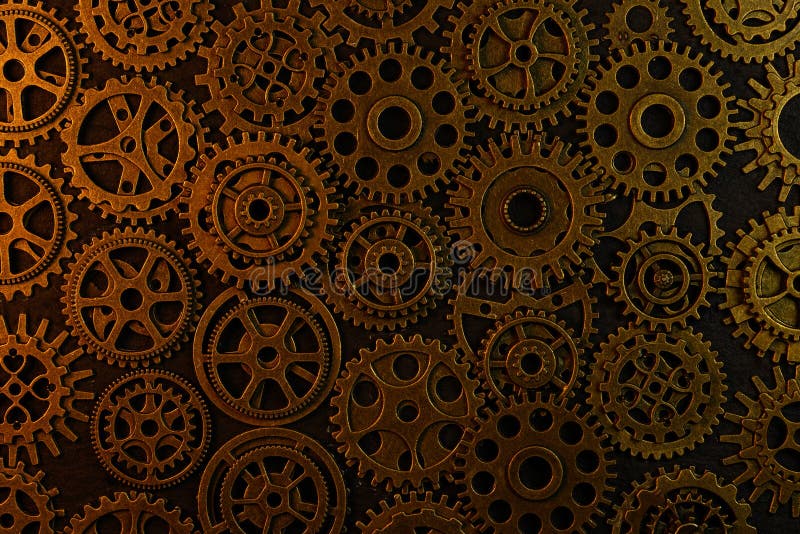 Cogs and Gear Wheels Arranged on Slate Rock Background Showing Textures ...