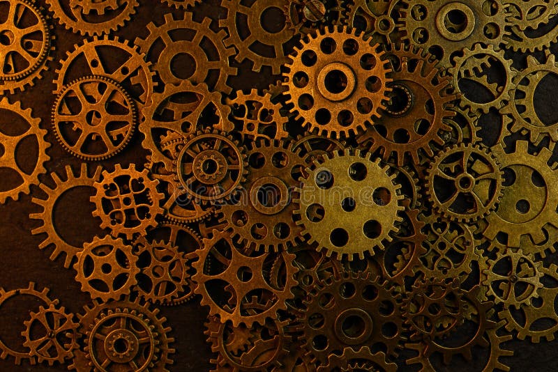 Cogs and Gear Wheels Arranged on Slate Rock Background Showing Textures ...