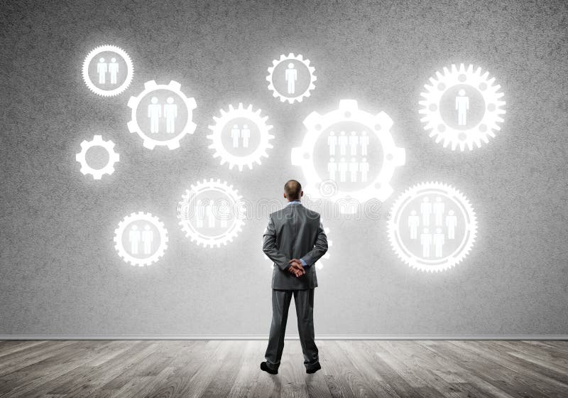 Cogwheel Engine Drawn on Concrete Wall As Symbol for Teamwork and ...