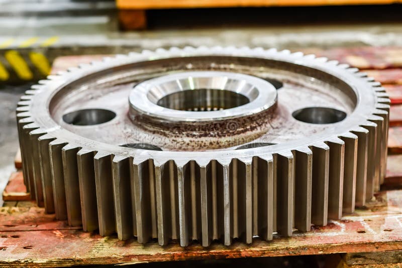Cogwheel Wheel on a Wooden Rack in a Warehouse Stock Photo - Image of ...