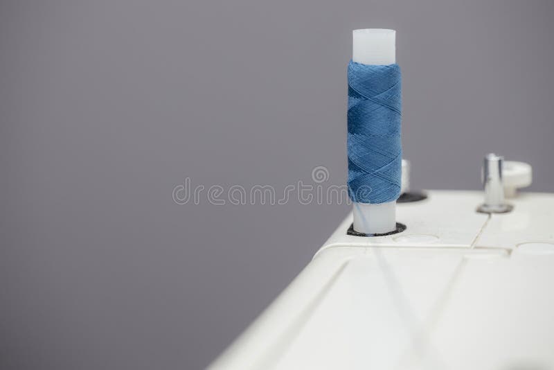 Coil with Blue Threads Installed on a Sewing Machine Stock Image ...