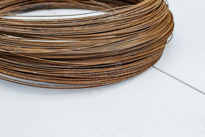 A coil of old rusty wire stock image. Image of fence - 188037673