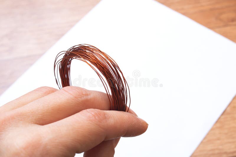 Coil of Opper Wire in Hand Closeup Stock Photo - Image of equipment ...