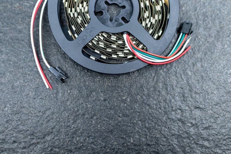 Coil of Rgb Led Strip on a Black Table. Led Strip for Creative Lighting ...
