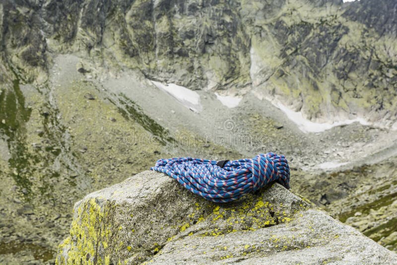Coil rope on a rock stock image. Image of environment - 59521993
