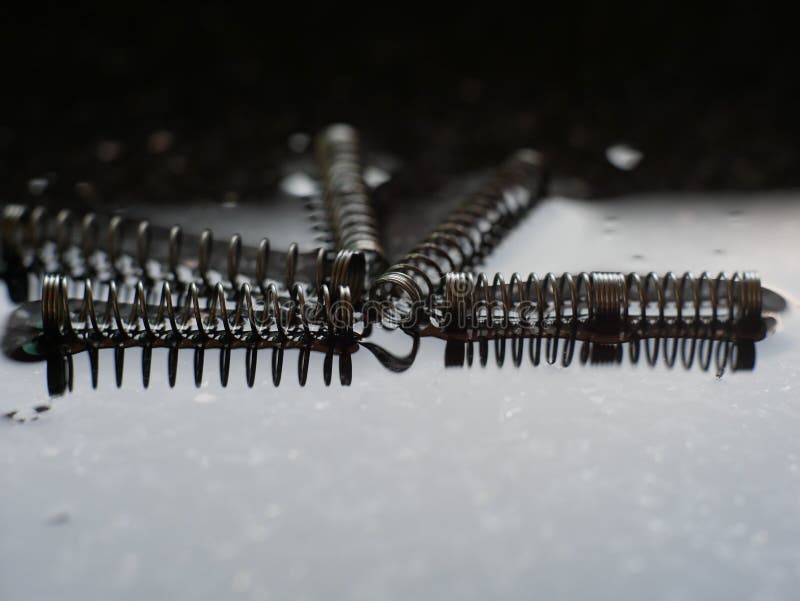 A Coil Spring from a Ballpoint Pen on Abstract Background Stock Image ...