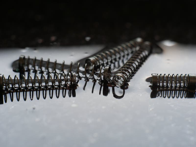 A Coil Spring from a Ballpoint Pen on Abstract Background Stock Image ...