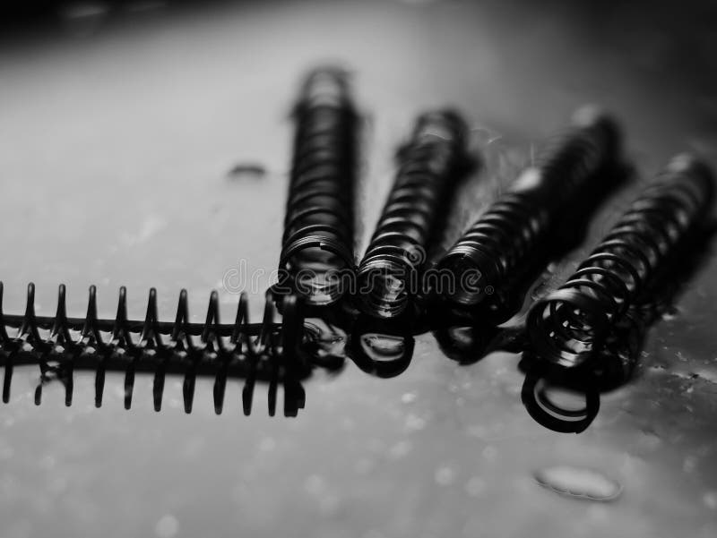 A Coil Spring from a Ballpoint Pen on Abstract Background Stock Image ...