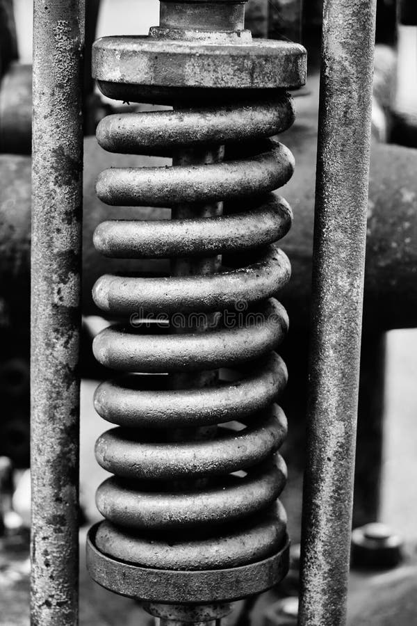 Coil Spring in One Guide, Black and White Stock Image - Image of ...