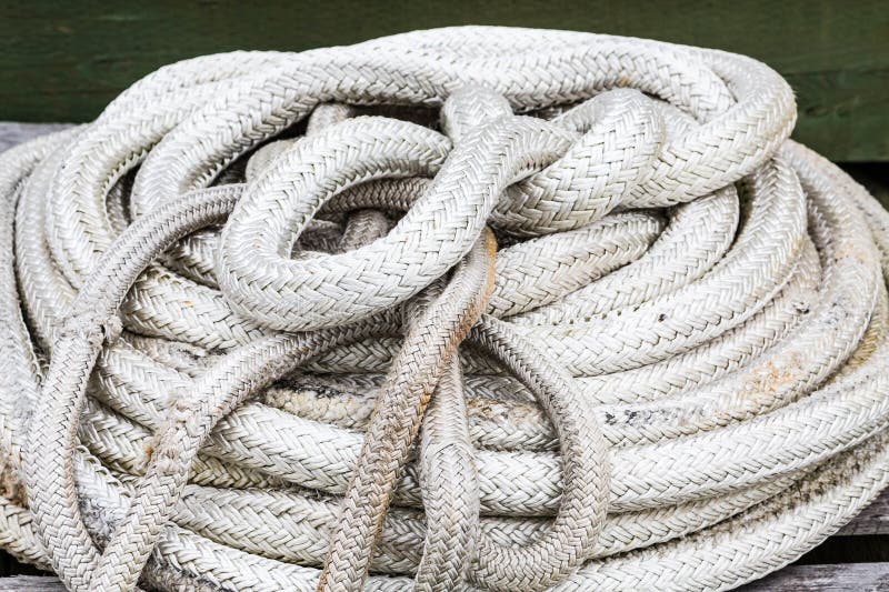 Coil of White Braided Rope stock photo. Image of secure - 51141570
