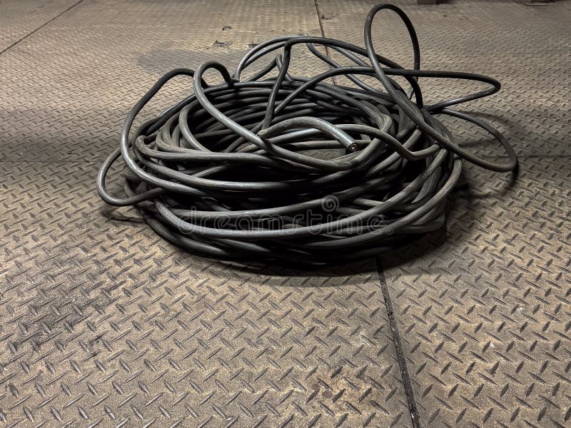 A Coiled Bundle of Dark Electrical Cables Stock Image - Image of coiled ...