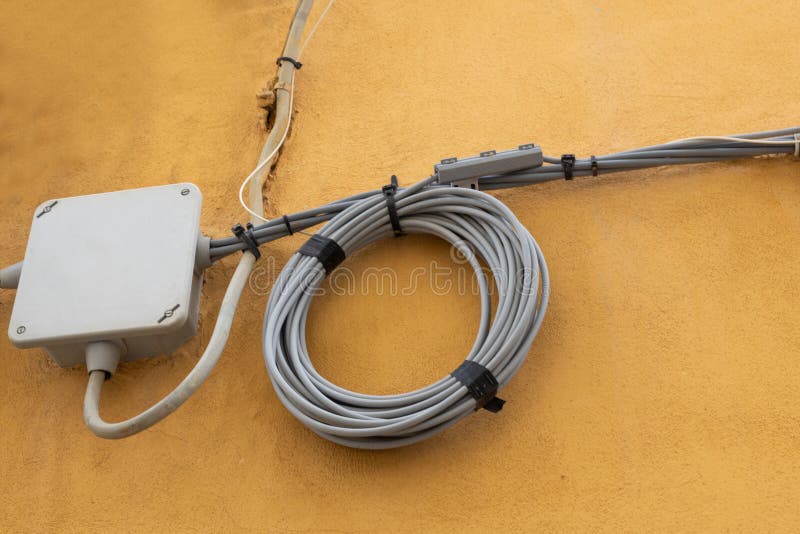 Coiled Electric Cable Yellow Wall Stock Photos - Free & Royalty-Free ...
