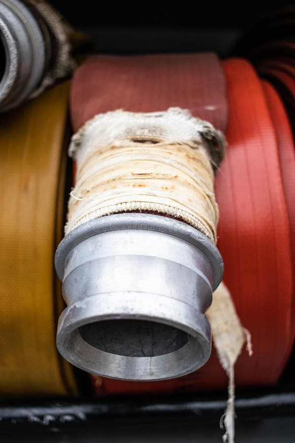 A Coiled Fire Hose on a Fire Engine Stock Photo - Image of hoses, tubes ...