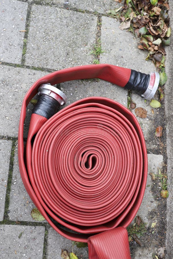 Coiled Fire Hose on Ground during 112 Day Presentation Stock Image ...