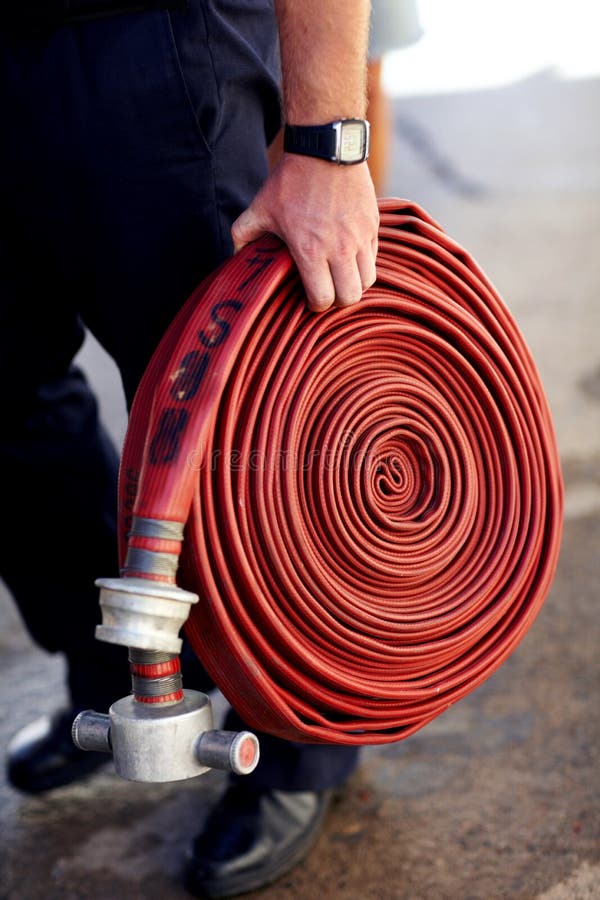 Firefighter Carrying Hose Photos - Free & Royalty-Free Stock Photos ...