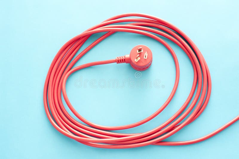 Coiled Red Electrical Cable or Lead with Plug Stock Photo - Image of ...