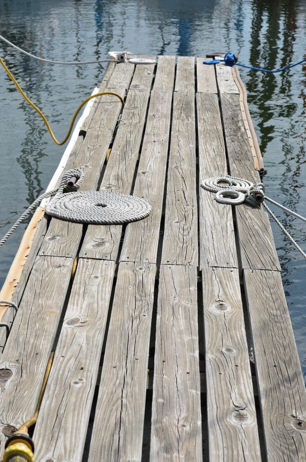 Coiled ropes on a dock stock image. Image of textures - 33055587