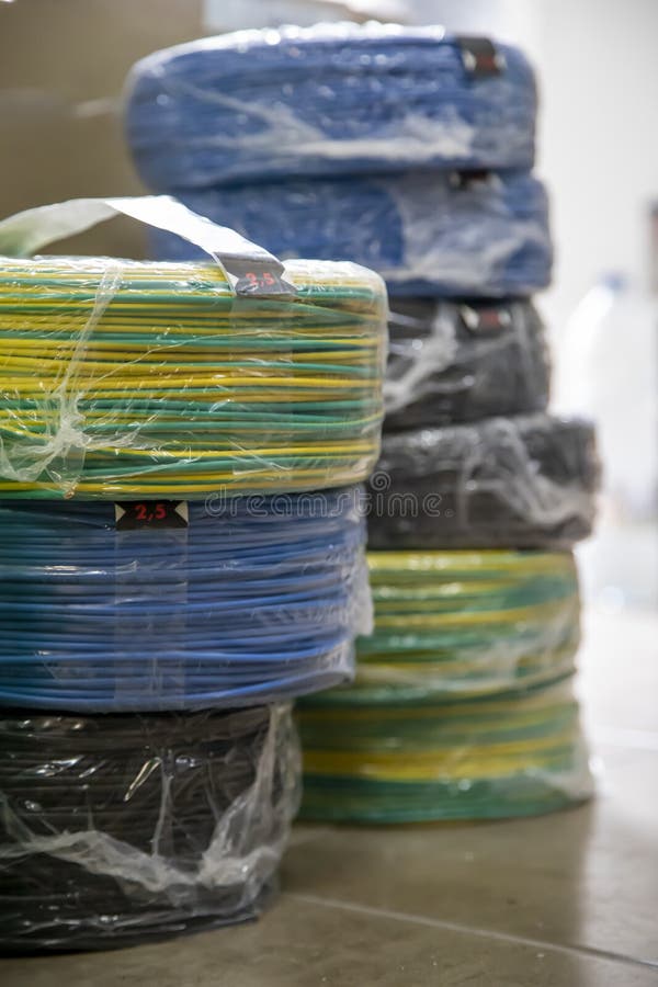 Coils of Electrical Cable of Various Colors on the Floor Stock Photo ...