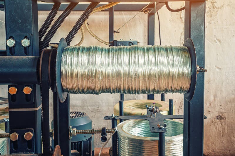 Coils of Plastic Wire in Workshop. Spinning and Winding of Plastic ...