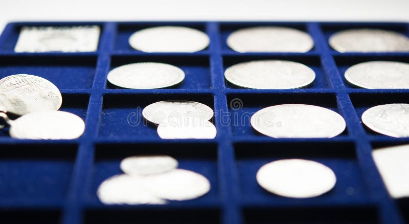 Coin Collection in Blue Coin Tray Isolated Stock Photo - Image of ...